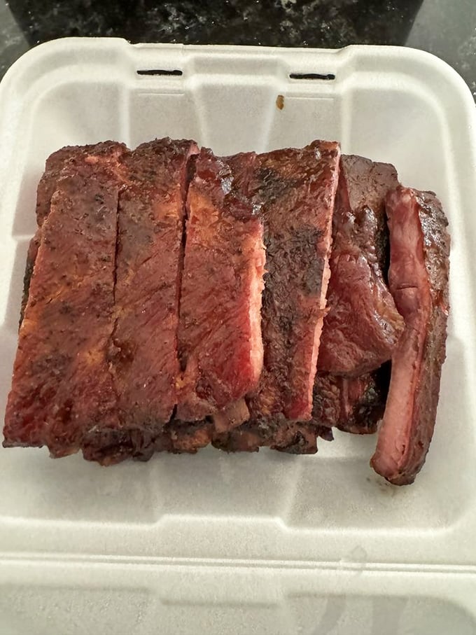 These ribs don't "fall off the bone"—they maintain that perfect bite that separates backyard barbecue from the real deal.