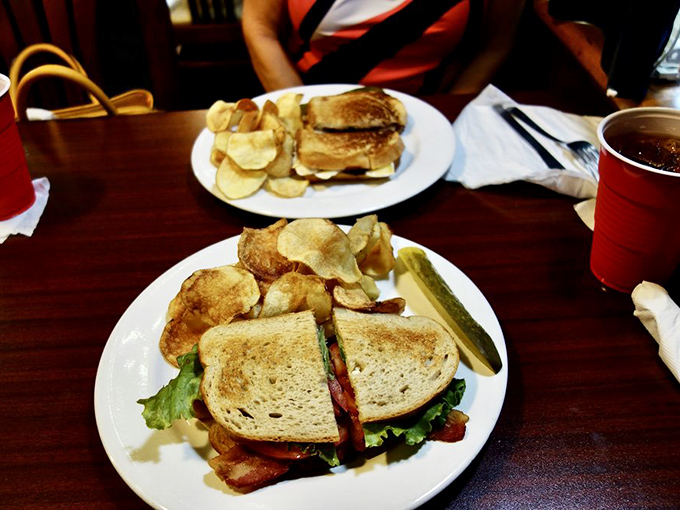 The classic BLT&mdash;where simplicity meets perfection. Crispy chips stand guard beside a sandwich that would make any conductor proud.