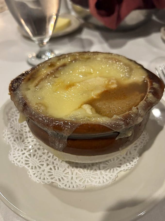 This isn't just French onion soup&mdash;it's a volcanic eruption of molten cheese atop a soul-warming broth that would make Julia Child swoon with delight.
