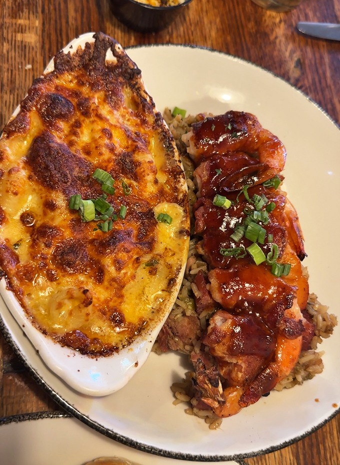 Louisiana's perfect marriage: creamy mac and cheese meets BBQ shrimp. Like finding your soulmate on a plate&mdash;rich, complex, and worth every calorie.