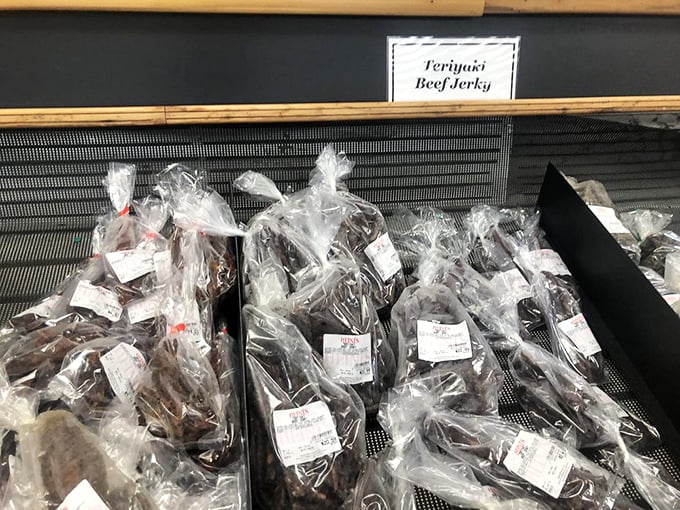 Not just cheese lives here! Teriyaki beef jerky sticks stand ready for carnivores who need protein between cheese samples. Balanced diet, right?