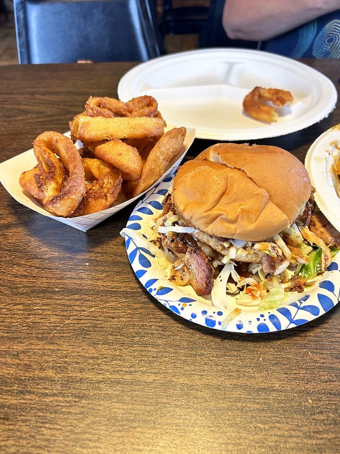 The perfect Mississippi marriage: a sandwich that doesn't skimp on fillings alongside golden onion rings that shatter with each blissful bite.