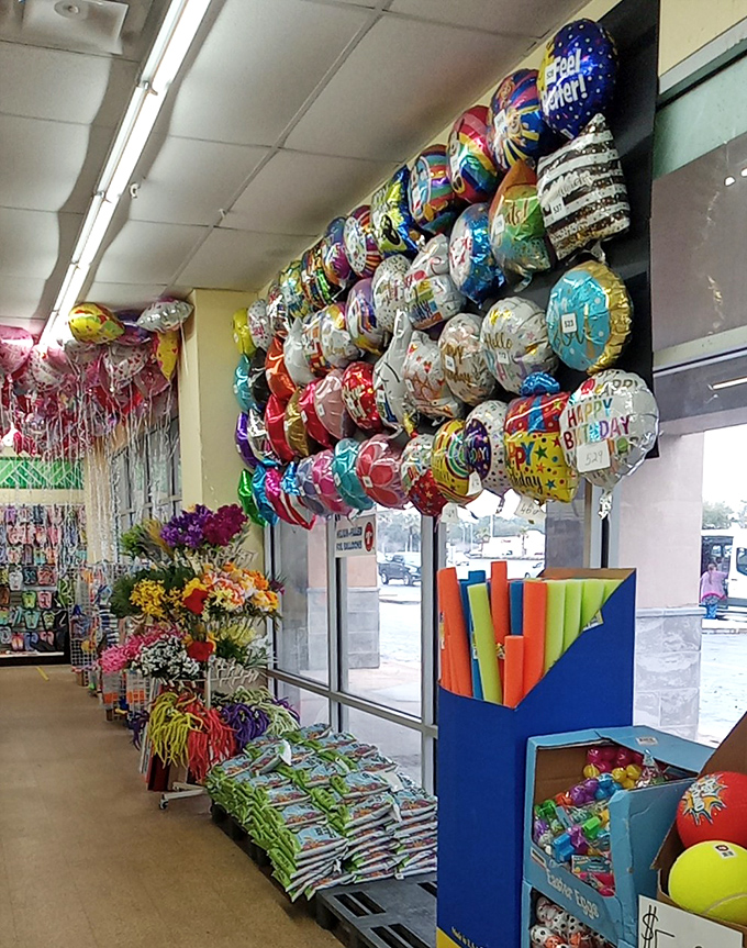 Birthday celebration central! Colorful balloons, festive decorations, and gift wrap all congregate in this corner of affordable festivity.
