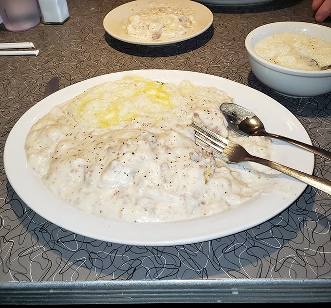 Biscuits and gravy so creamy and peppery they'd make your Southern grandmother weep with joy &ndash; a fluffy canvas for savory artwork.