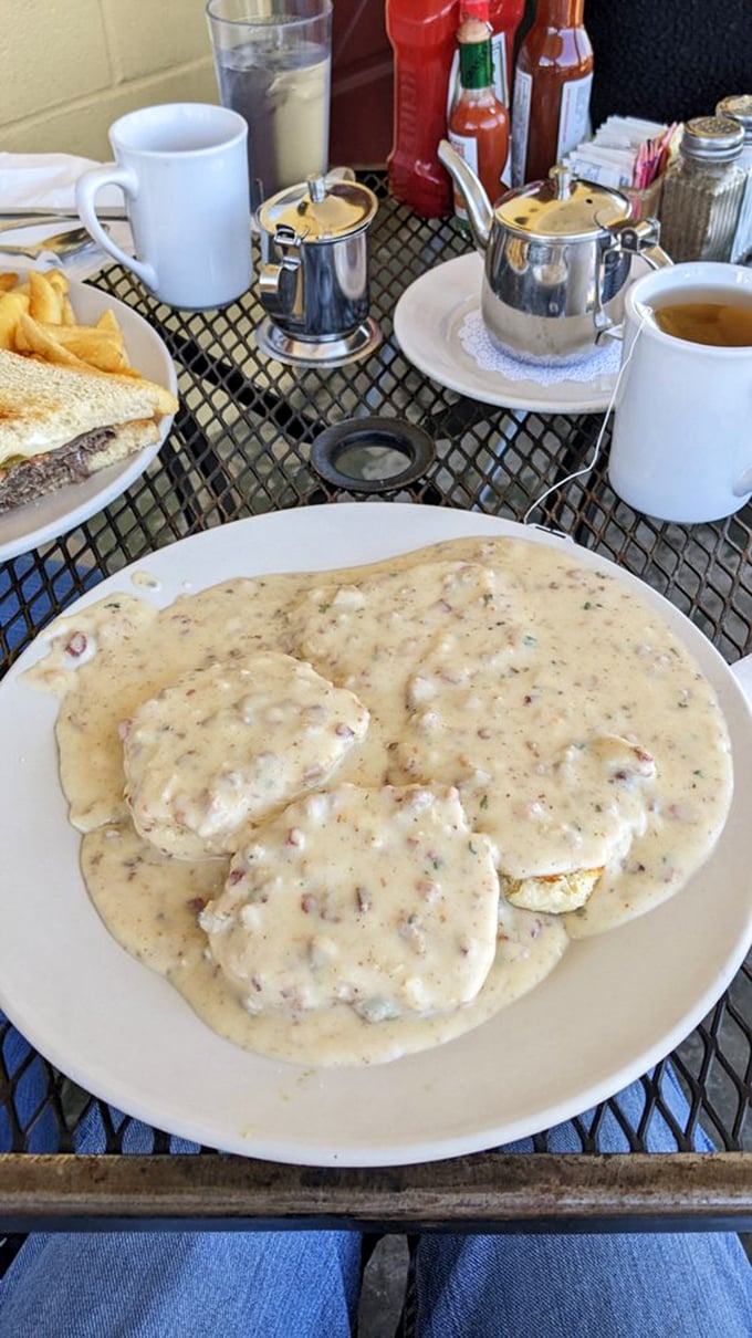 Biscuits swimming in country gravy that looks like it could tell stories. This plate doesn't just feed your body&mdash;it nourishes your soul.