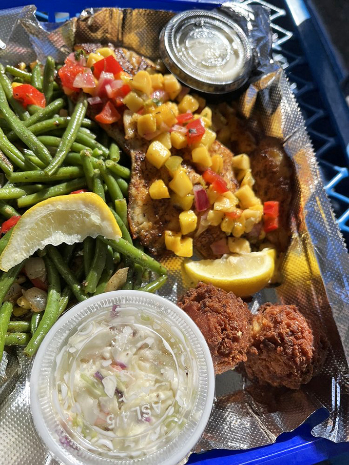 Blackened fish with mango salsa &ndash; where Florida's heat meets its sweet side. The green beans are just there to make you feel virtuous.