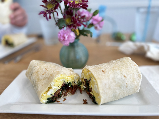 This breakfast burrito has that perfect cross-section reveal—like a delicious archaeological dig through layers of morning happiness.