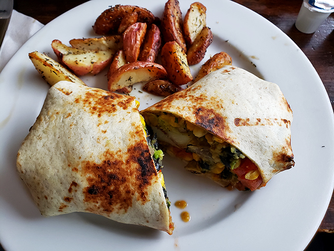 Breakfast burritos often make promises they can't keep. This golden-grilled beauty, however, appears to be delivering on all fronts.