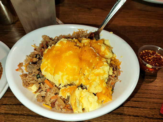 Breakfast fried rice that would make your takeout place jealous. Those fluffy scrambled eggs melting into savory rice is the morning hug your stomach deserves.