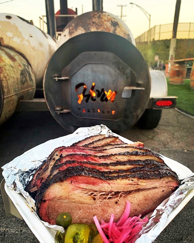 This brisket's smoke ring is so perfect it belongs in the Louvre. The pink halo represents hours of patient smoking&mdash;art you can actually eat.