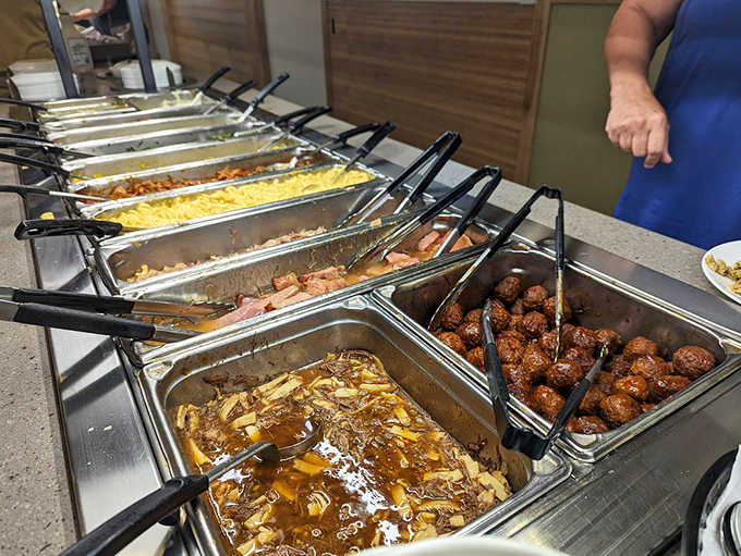 The buffet line at Der Dutchman: where "I'll just have a little of everything" becomes the biggest lie you'll tell yourself today.