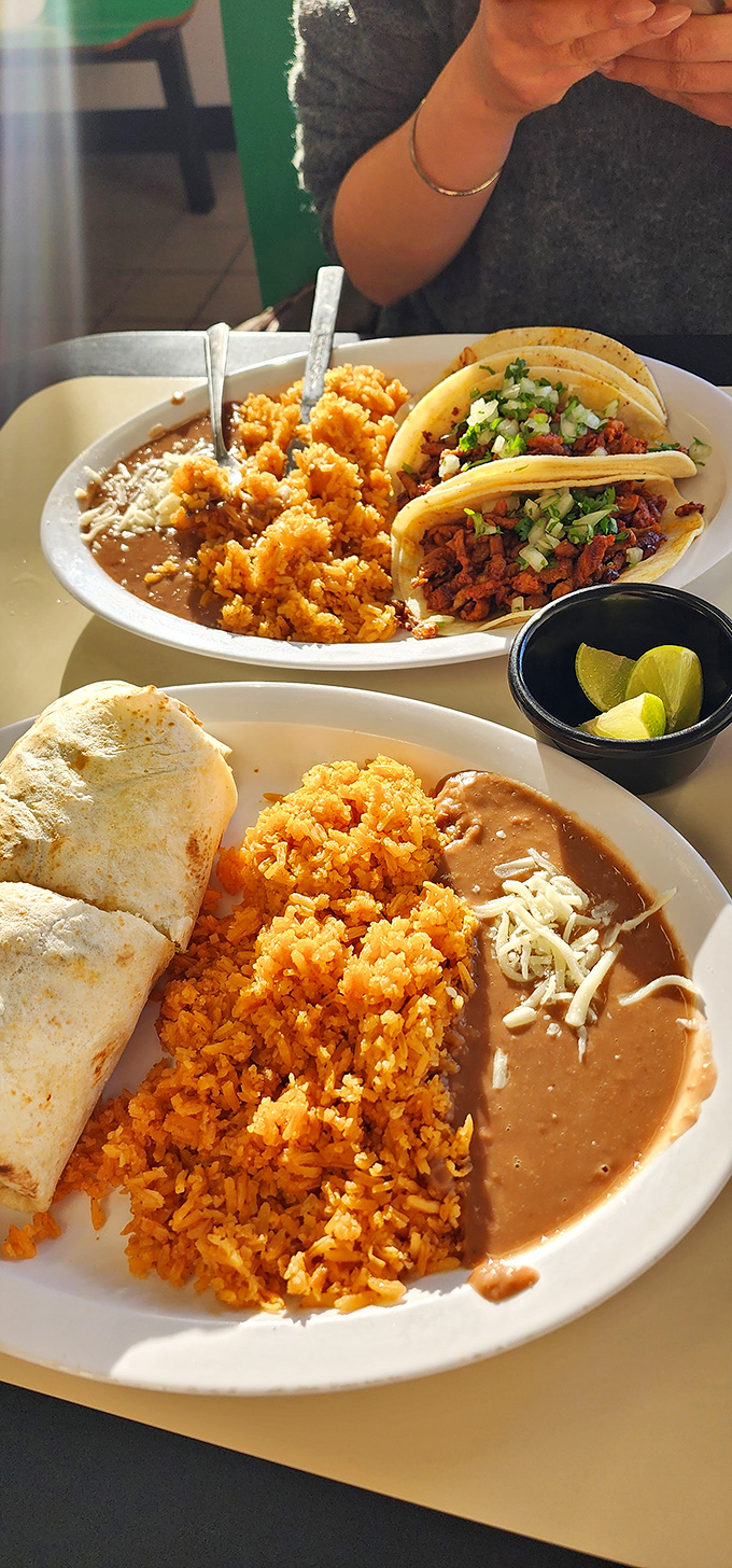 A feast fit for royalty&mdash;the rice glows like sunset, the beans simmer with depth, and those tacos? They're speaking a language everyone understands.