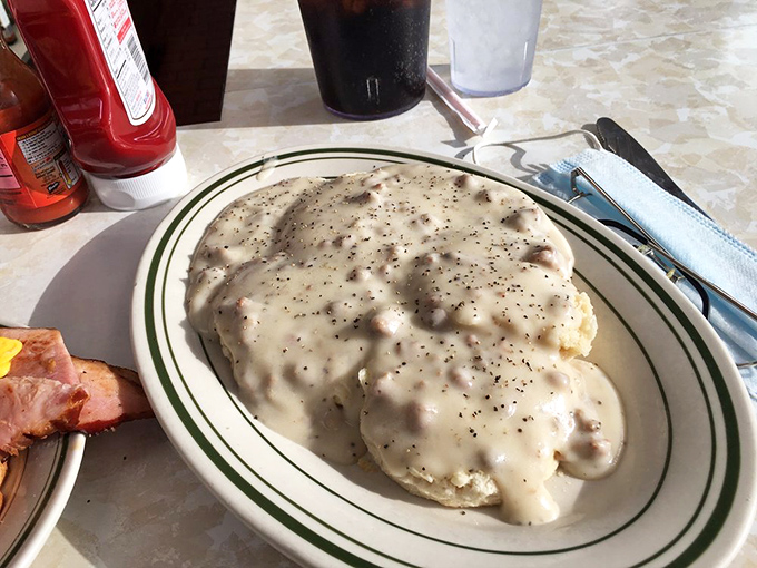These biscuits and gravy aren't just breakfast&mdash;they're edible architecture, building a foundation strong enough to support your entire day.