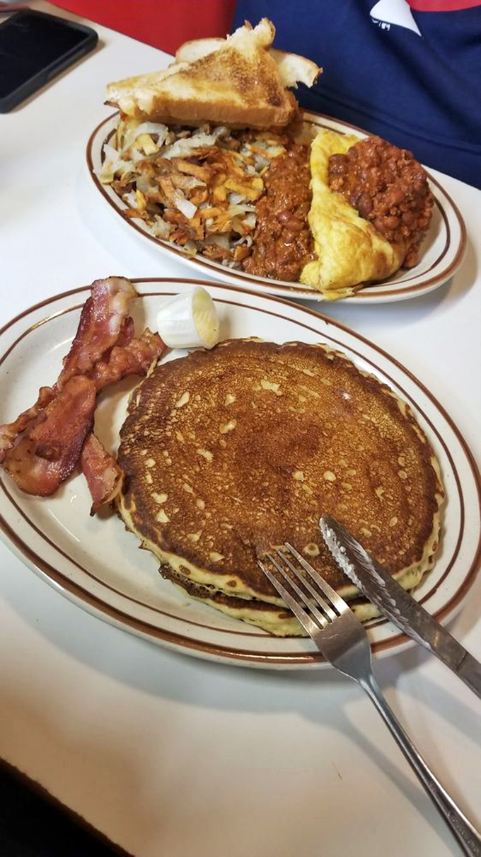 The pancake that launched a thousand satisfied sighs sits alongside an omelet that could make a French chef weep with envy.