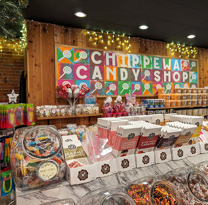 The vibrant Chippewa Candy Shop sign watches over a kingdom of caramel corn and chocolate-covered everything.
