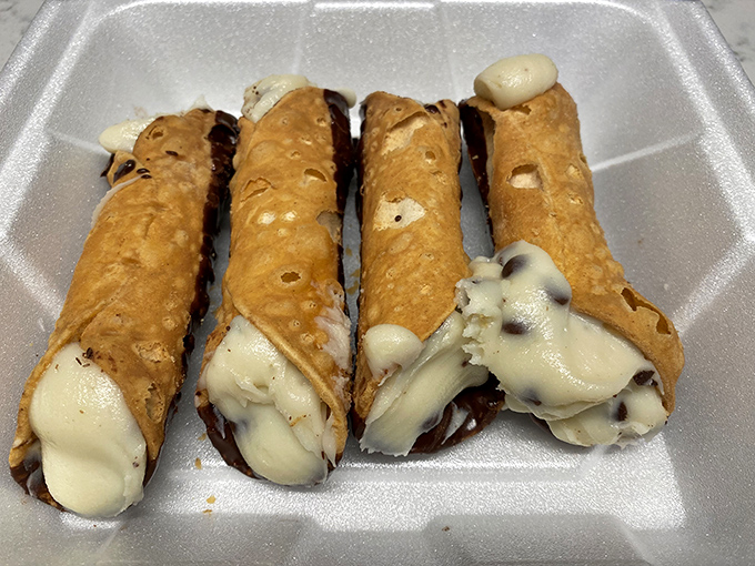 The holy grail of Italian pastry: cannoli with perfectly crisp shells giving way to creamy, sweet filling. These aren't just desserts&mdash;they're edible happiness at $2 a pop. 