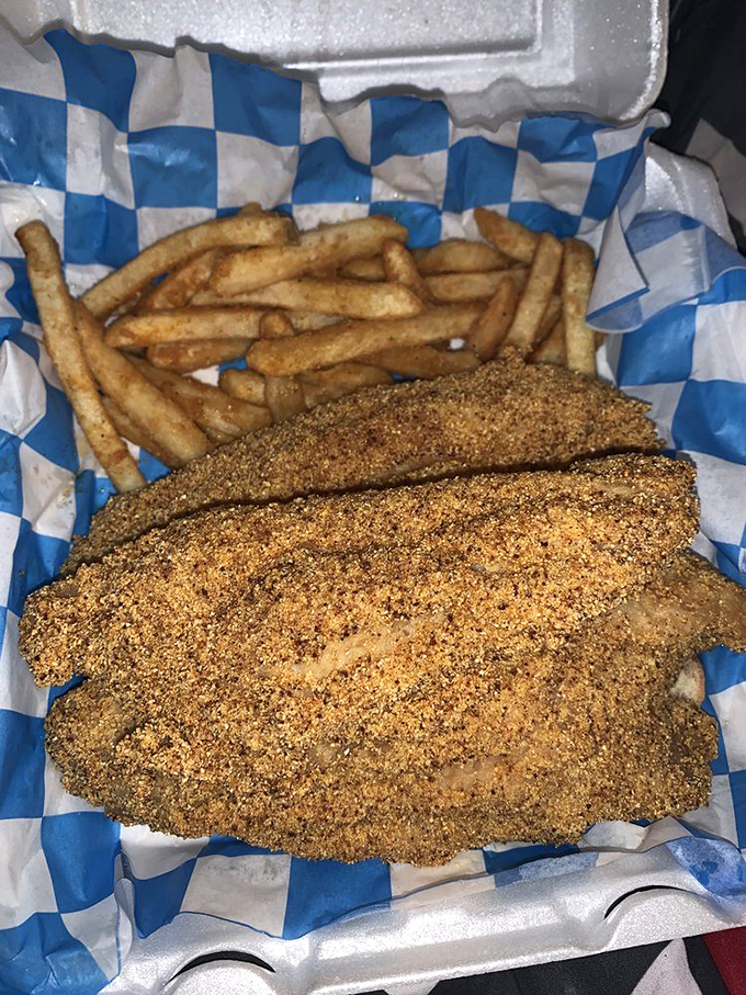 This cornmeal-crusted catfish isn't just dinner; it's edible evidence that sometimes the best seafood comes from the most unexpected places.