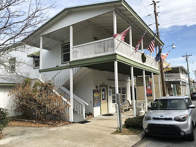 This classic Florida structure with its graceful balcony has weathered hurricanes and changing times, standing as a testament to Cedar Key's resilient spirit.