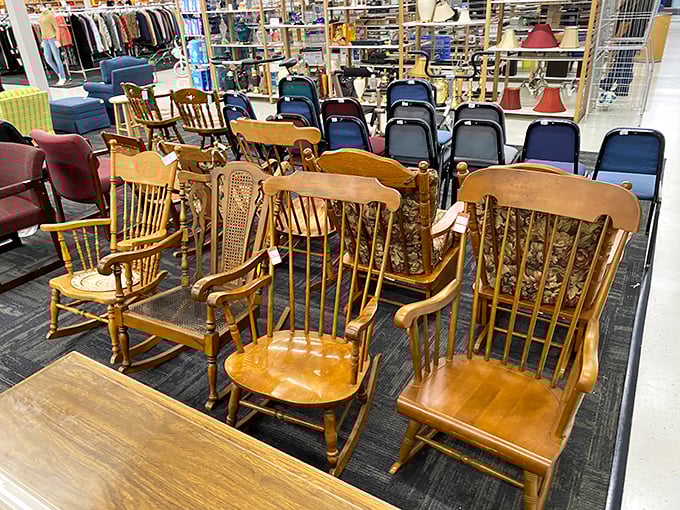 The chair gathering looks like a wooden family reunion. These well-crafted rockers have seen generations of stories and are ready for a few more chapters.