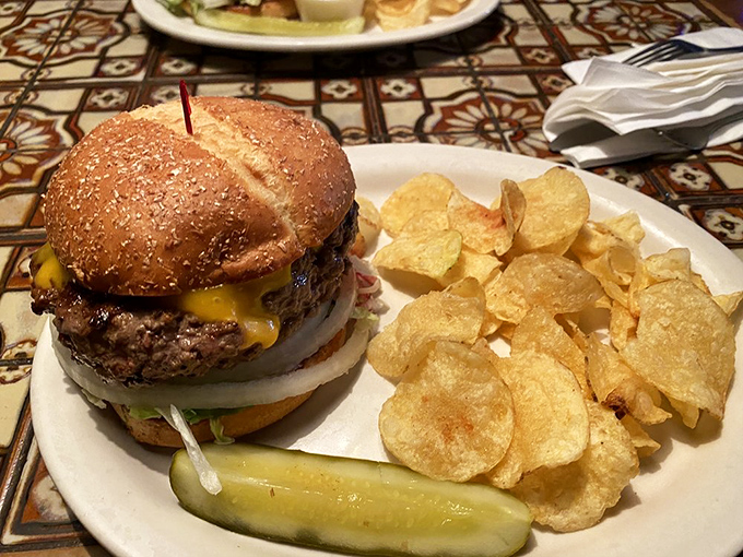 A burger so perfectly constructed it deserves its own architectural award. Those chips aren't garnish &ndash; they're the supporting cast in this meaty drama.