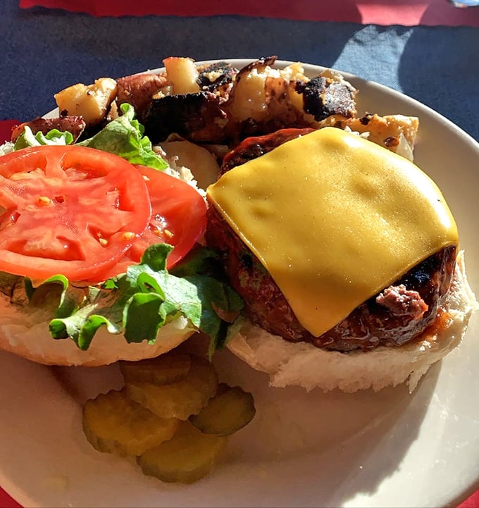 The perfect burger doesn't exi&mdash; Oh wait, there it is, complete with melted cheese cascading down the sides like a yellow waterfall of happiness.