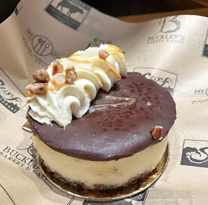 The chocolate-topped cheesecake doesn't just satisfy a craving&mdash;it creates new ones. That caramel drizzle is performing some serious flavor sorcery.