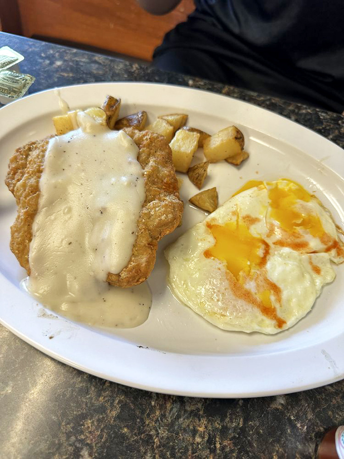Chicken fried steak with gravy so good you'll want to write home about it&mdash;if you can put your fork down long enough.