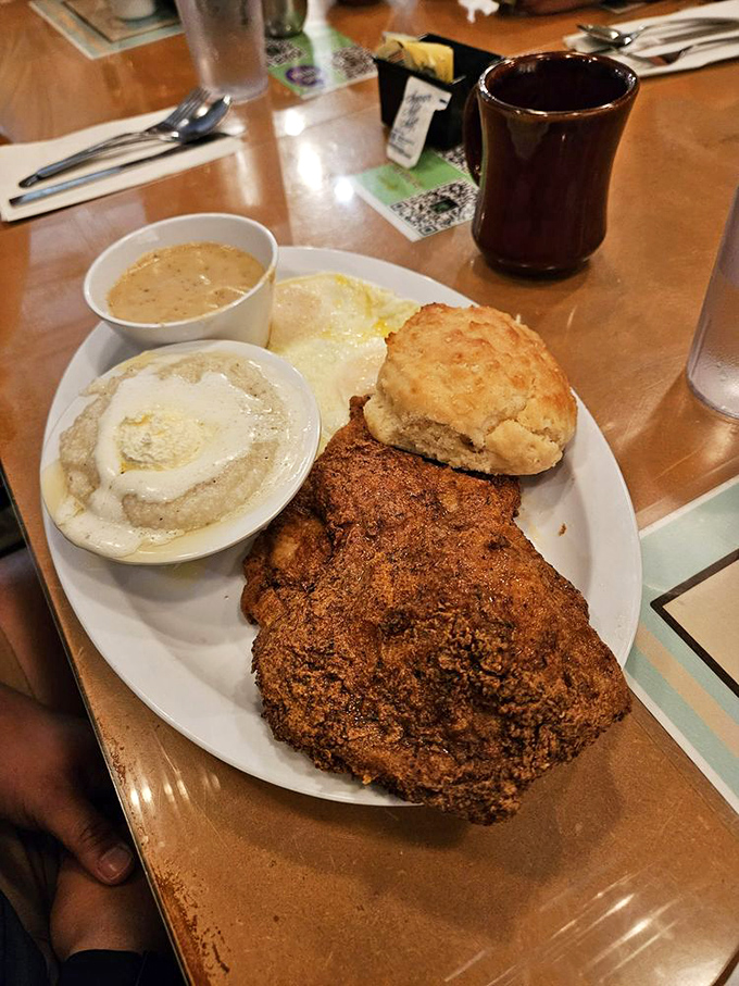 Chicken fried steak that's bigger than your face, with a golden crust that crackles like autumn leaves. The biscuit alone deserves its own fan club.