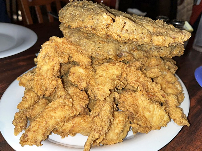 A mountain of crispy goodness that requires both strategy and commitment. Your diet called &ndash; it's taking the day off.