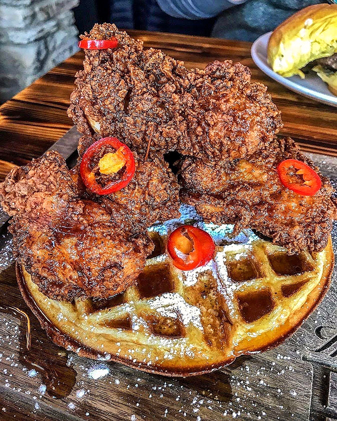 Whoever decided fried chicken belongs on waffles deserves a Nobel Prize. This crispy-meets-fluffy masterpiece proves breakfast rules don't exist.