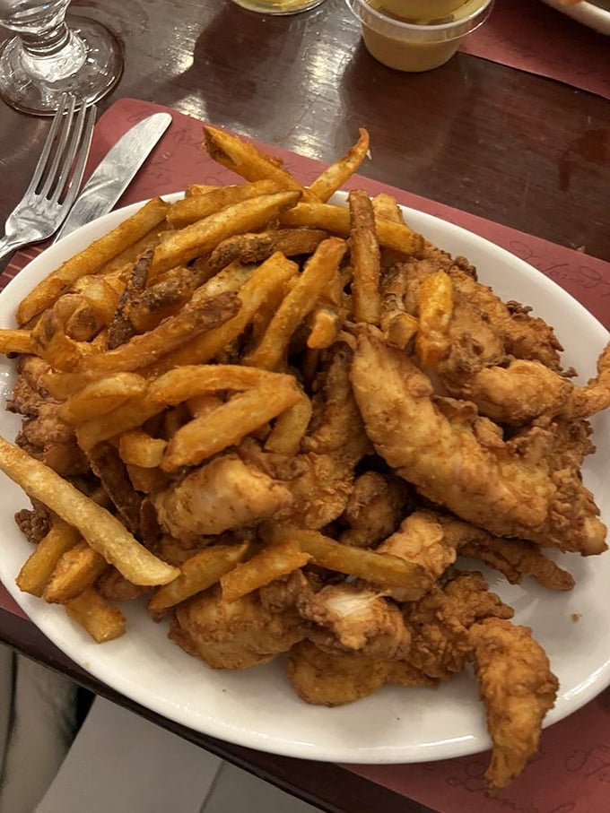 The plate that launched a thousand cravings&mdash;chicken tenders and fries in their natural habitat, no filter needed.