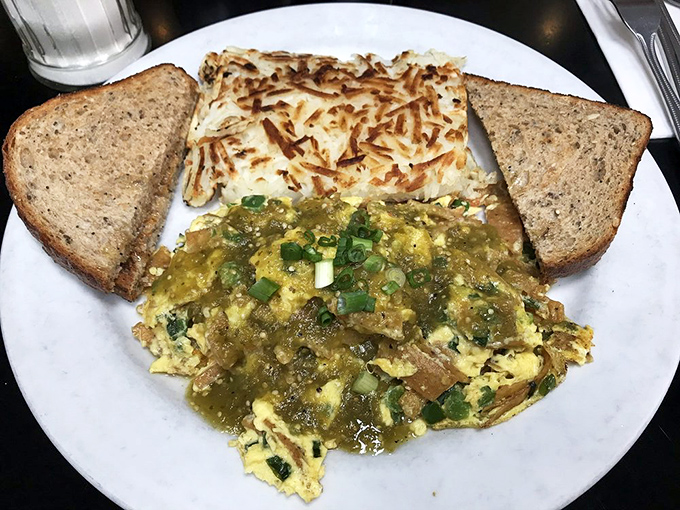 The Chilaquiles Scramble isn't just breakfast&mdash;it's edible art. That perfect marriage of eggs, salsa verde, and crispy tortilla chips deserves its own museum exhibit.