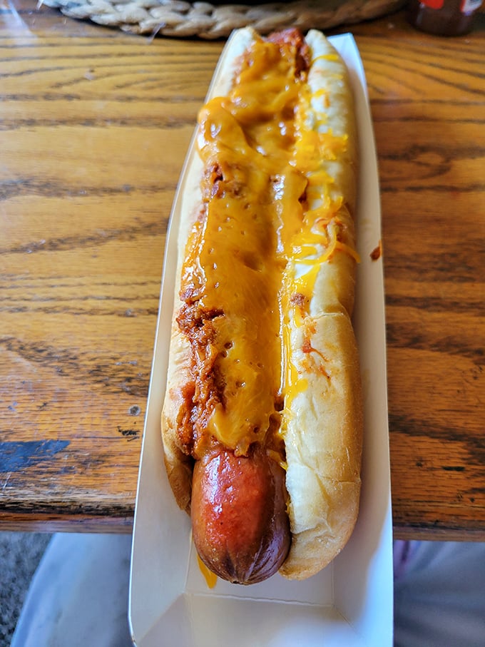 This isn't just a chili dog&mdash;it's edible architecture. The melted cheese creates that perfect golden canopy over savory chili.