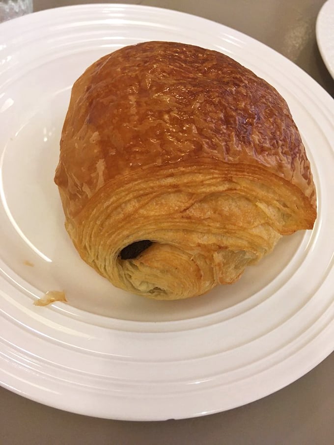 The chocolate croissant's burnished exterior hides dark chocolate ribbons within&mdash;proof that the best presents come in flaky packages.