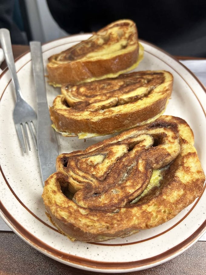 French toast that makes you question why anyone bothers with fancy brunch spots. Simple, golden, and perfectly executed&mdash;the breakfast equivalent of a classic vinyl record.
