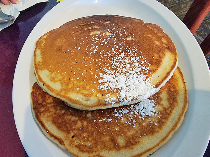 These golden-brown pancakes dusted with powdered sugar aren't just breakfast&mdash;they're the reason alarm clocks were invented.