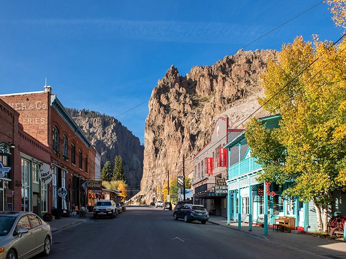 Main Street in autumn offers a masterclass in small-town splendor, where golden aspen leaves complement storefronts and mountains stand like sentinels.