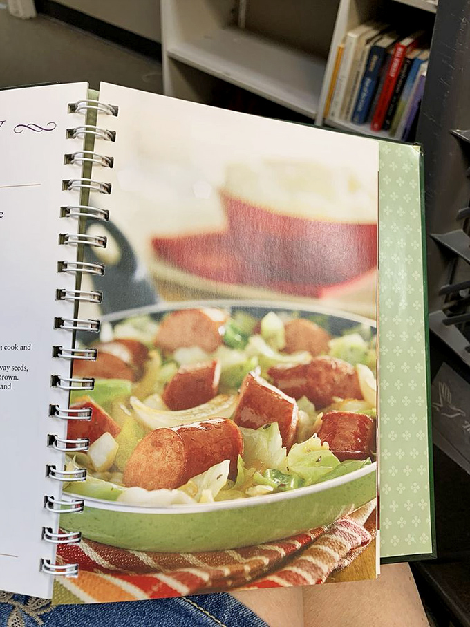 A spiral-bound cookbook holds secrets to meals that once brought families together around dinner tables. 