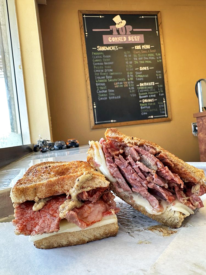 The cross-section reveals the truth: this isn't just a sandwich, it's a perfectly balanced ecosystem of flavors where every ingredient plays its essential role.