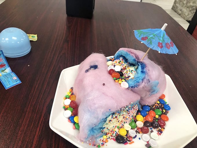 Not your average beach umbrella situation. This cotton candy creation looks like what would happen if a carnival and an ice cream parlor had a delicious baby.