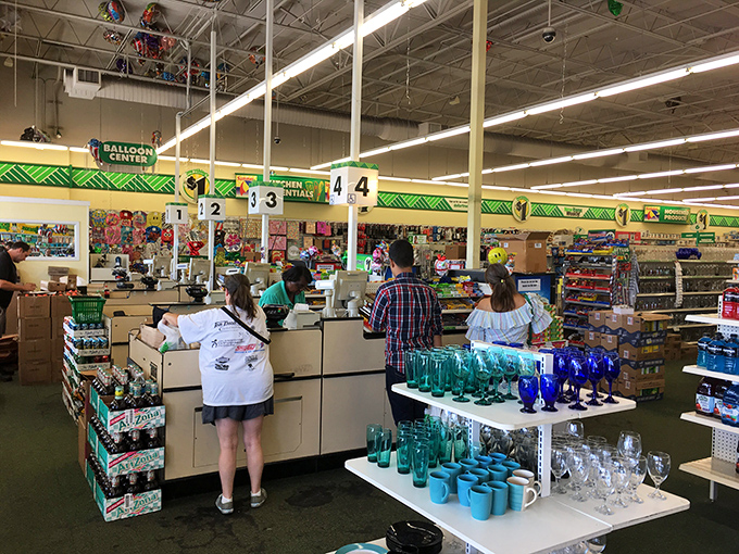 The checkout area&mdash;where dreams and dollars meet their final reckoning, and where cashiers perform the magic of fitting seemingly impossible amounts into those iconic plastic bags.