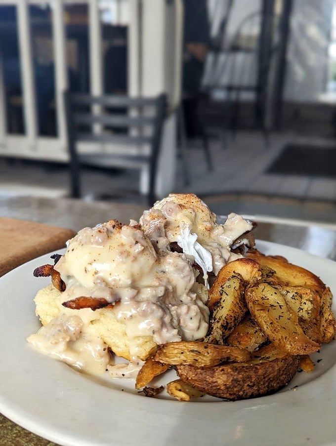 Breakfast architecture at its finest. This gravity-defying creation of eggs, gravy, and potatoes is what morning dreams are made of.