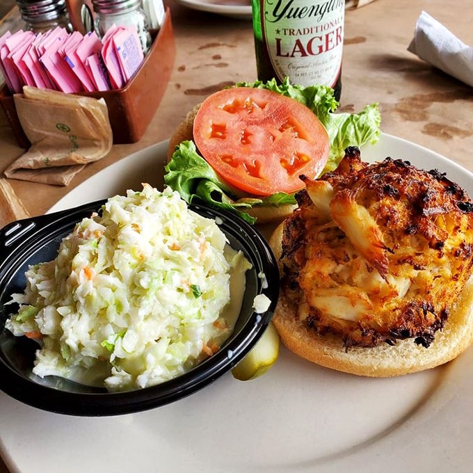 The golden-brown crab cake that launched a thousand debates about filler ratios&mdash;this one clearly prioritizes sweet lump meat over breadcrumbs.