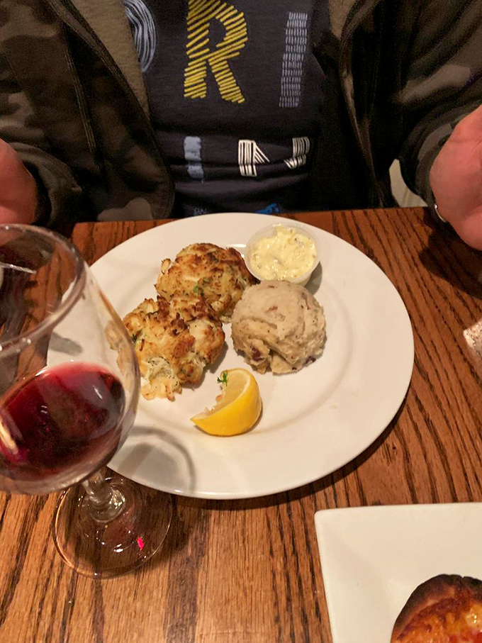 The perfect crab cake doesn't exi&mdash; wait, there it is, golden-brown with just enough breadcrumbs to hold the crab party together.