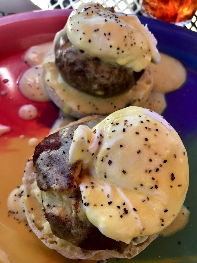 These Benedicts aren't messing around&mdash;perfectly poached eggs atop savory cakes, draped in hollandaise that's practically begging to be photographed.