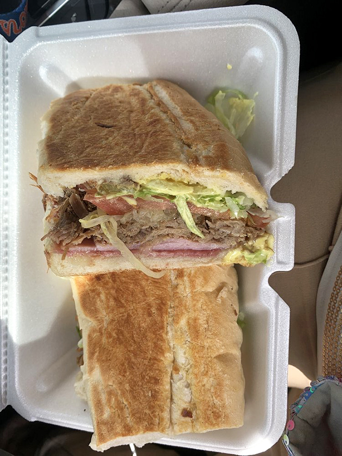 This Cuban sandwich isn't just pressed &ndash; it's been persuaded into perfection, layers of ham, pork, and cheese creating the kind of harmony that would make a barbershop quartet jealous.