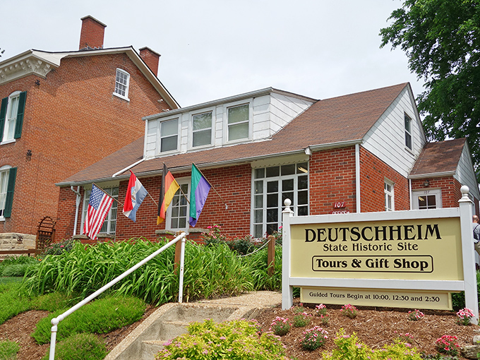The Deutschheim State Historic Site&mdash;where you can experience German heritage without the jet lag or passport hassle. Those flags aren't just decorative; they're a colorful reminder of cultural connections.