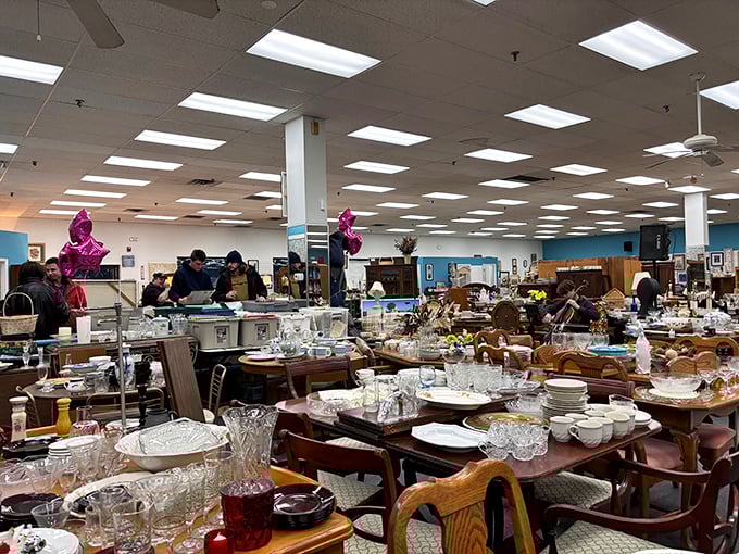 An elegant desk anchors a room of possibilities. If furniture could talk, these pieces would share tales spanning generations of Illinois dinner parties.