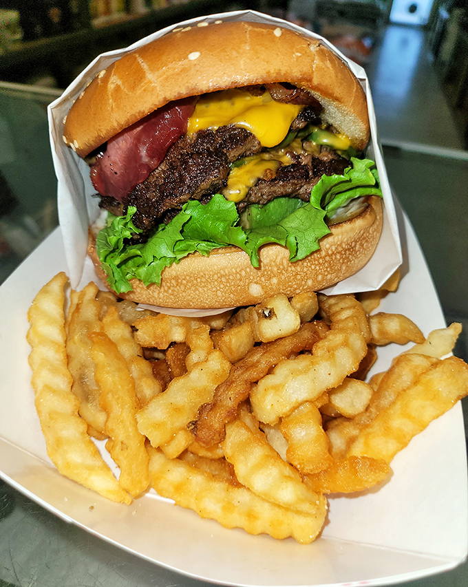 This isn't just a burger&mdash;it's edible architecture with layers of beef, cheese, and fresh veggies that somehow defy gravity.