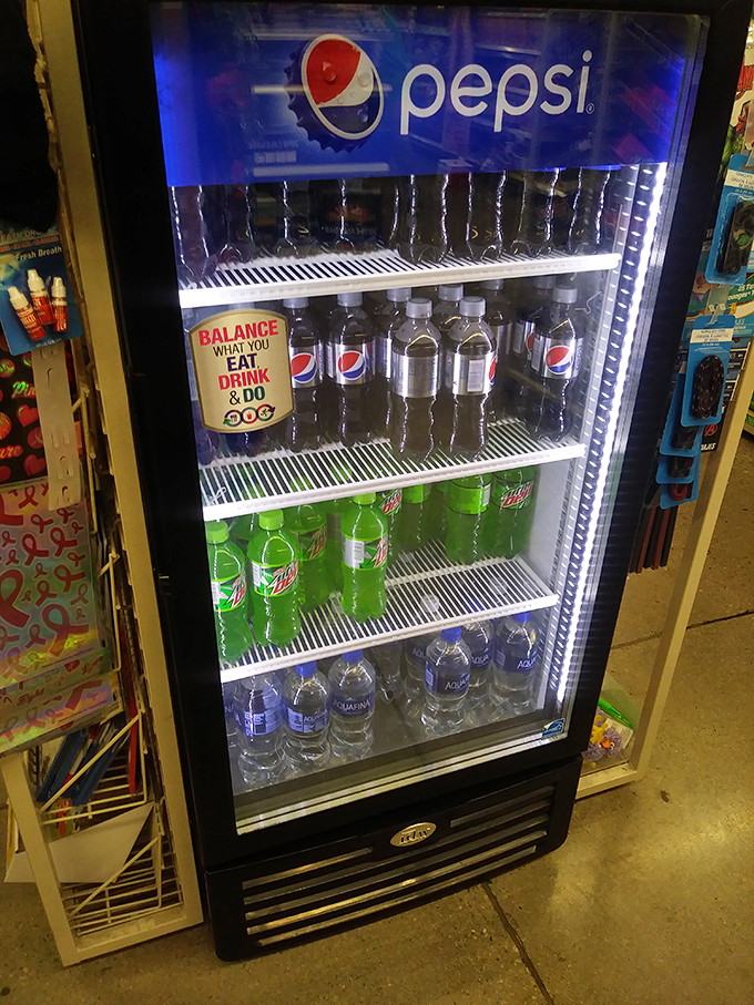 The refrigerated section: where your beverage cravings meet your wallet's sigh of relief.